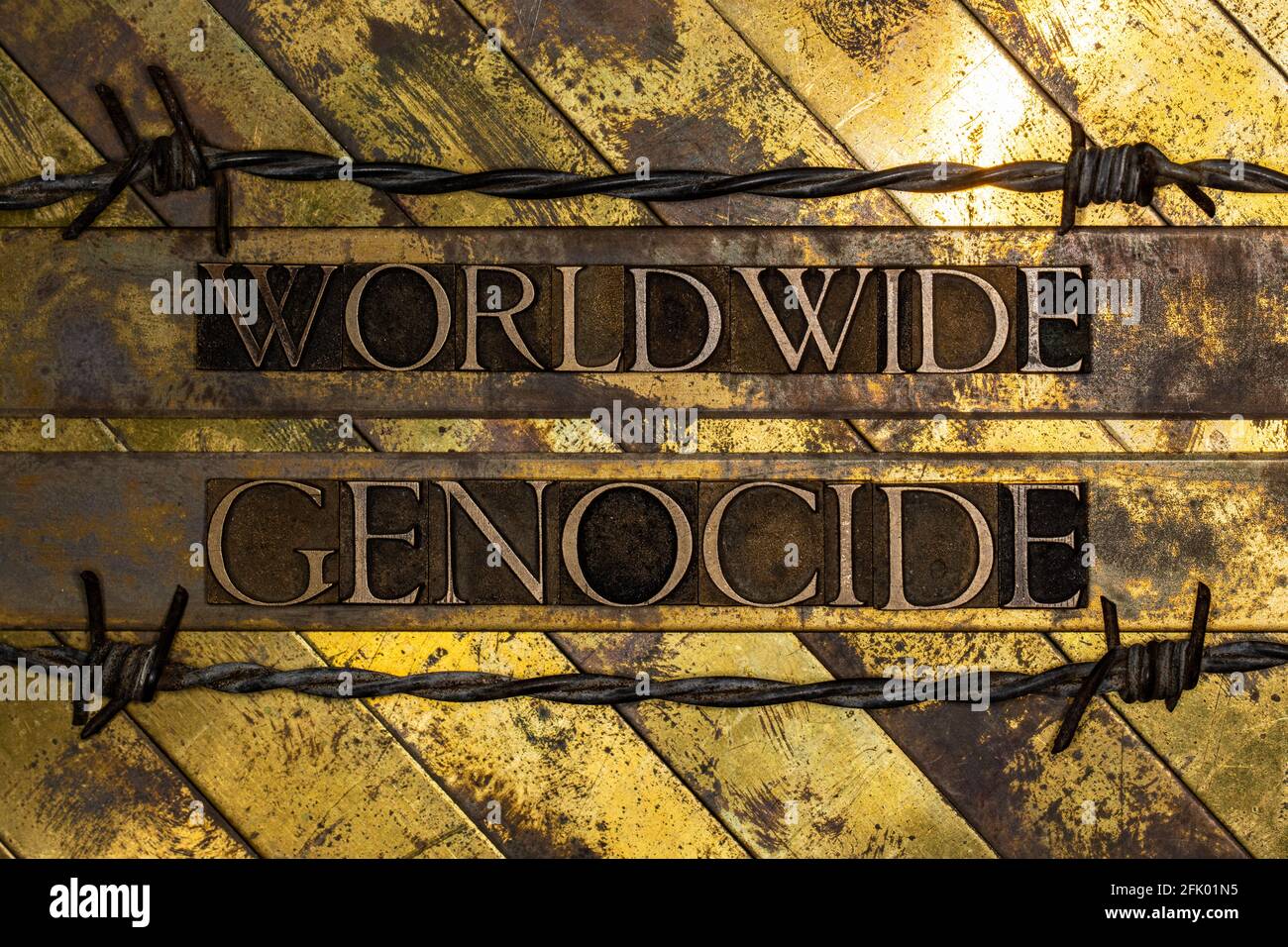 Worldwide Genocide text lined with barbed wire on vintage textured ...