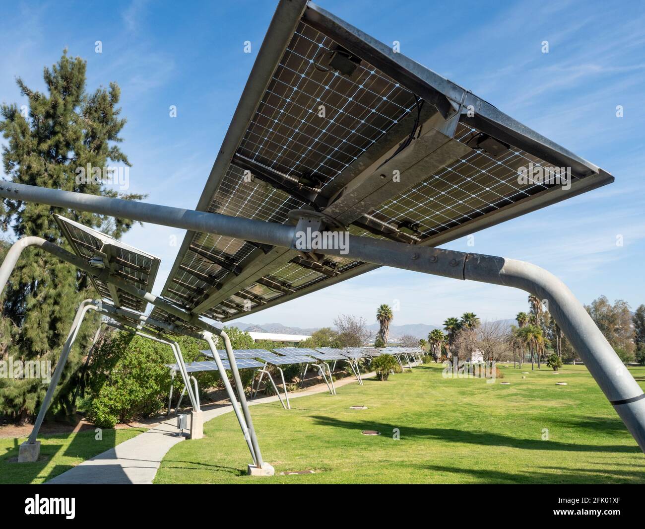 Photovoltaic solar cells on a metal structure along a path in the ...