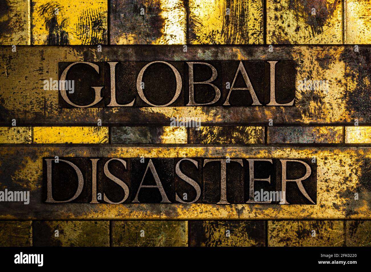Global Disaster text on textured grunge copper and vintage gold ...