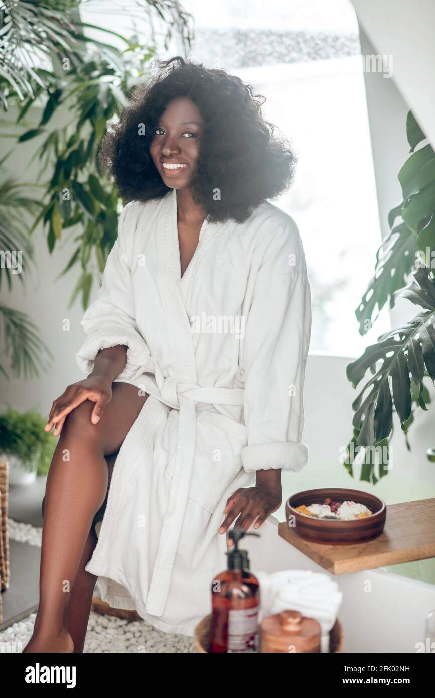 Pretty african american woman spending time in a spa salon Stock Photo ...