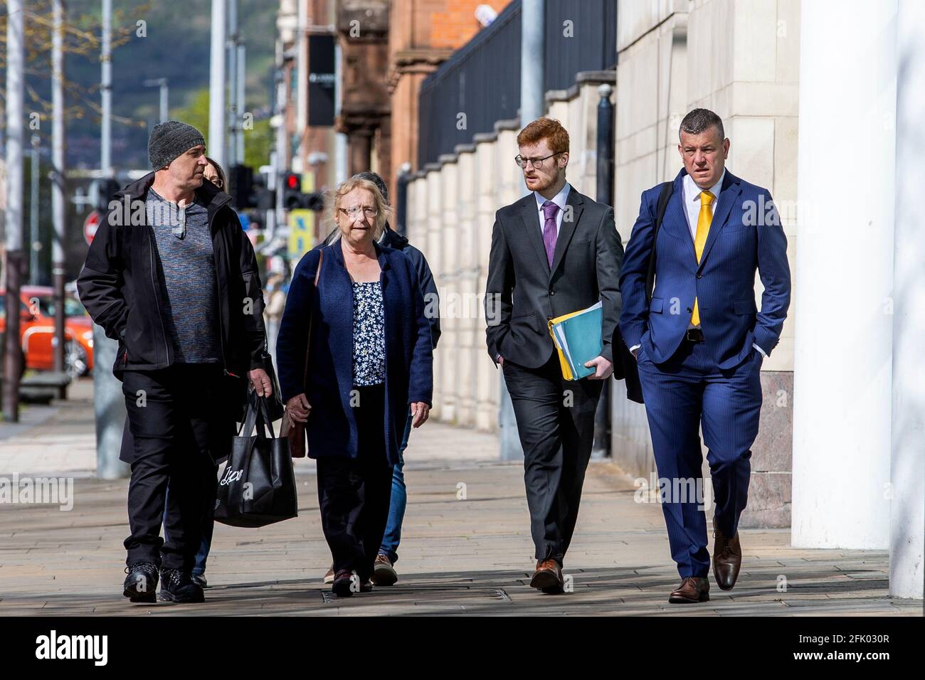 Joe McCann's widow Anne (centre) and family with their solicitor Niall ...