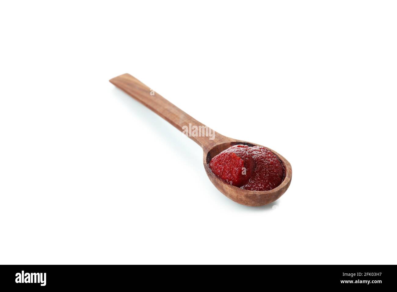 Spoon with tomato paste isolated on white background Stock Photo - Alamy