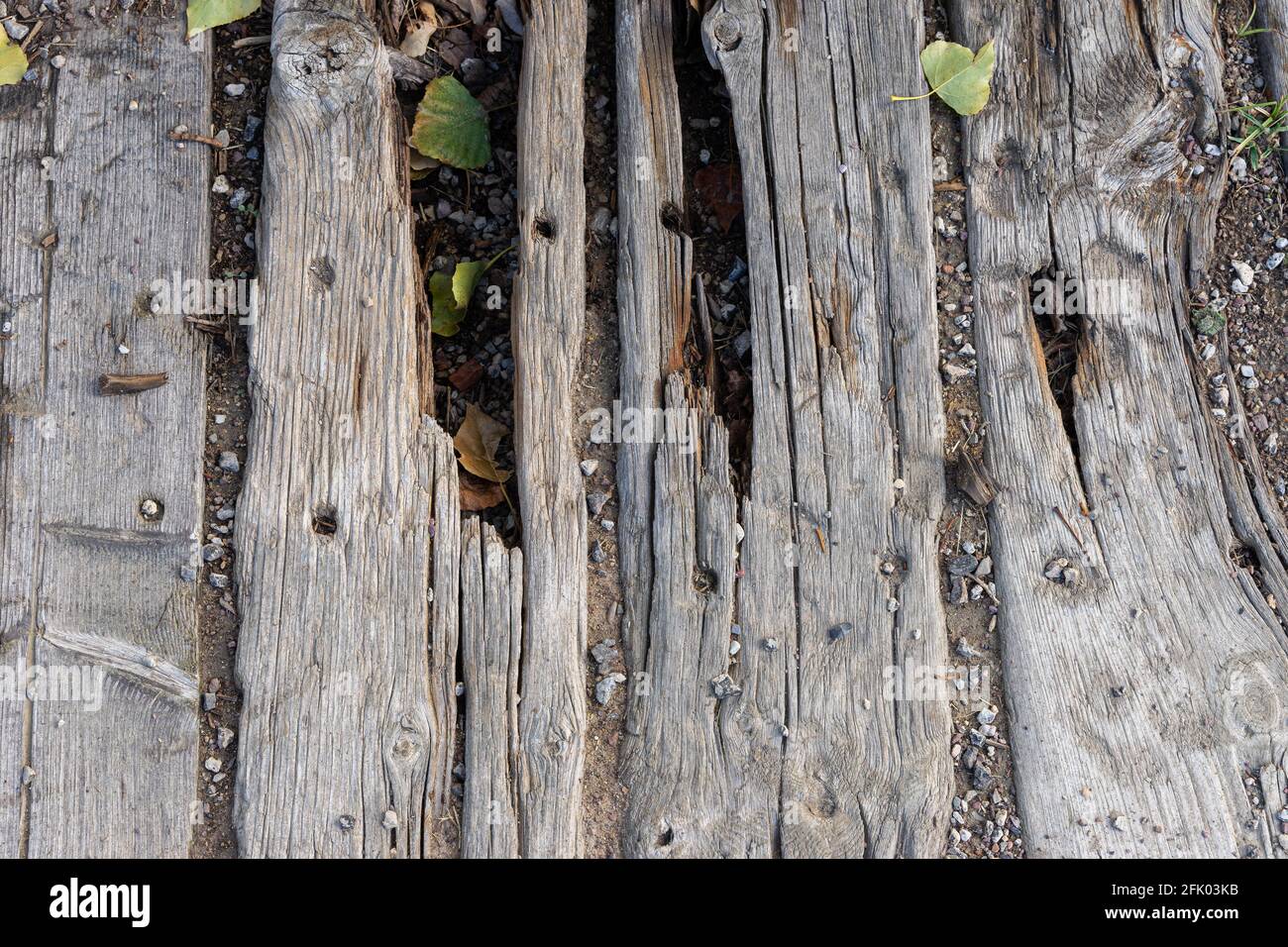 Weathered wooden footpath texture as background Stock Photo - Alamy