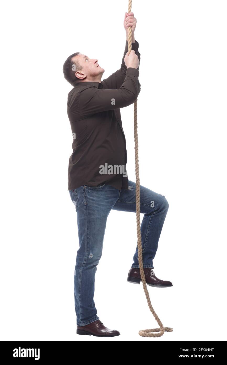 purposeful man climbing the rope. isolated on a white background Stock ...