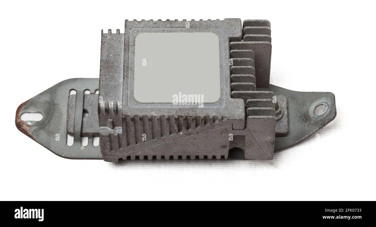 Metallic car engine control unit with plastic elements on a white ...