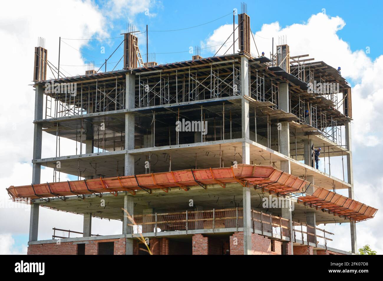 Civil construction of a building with part of the structure ready and ...