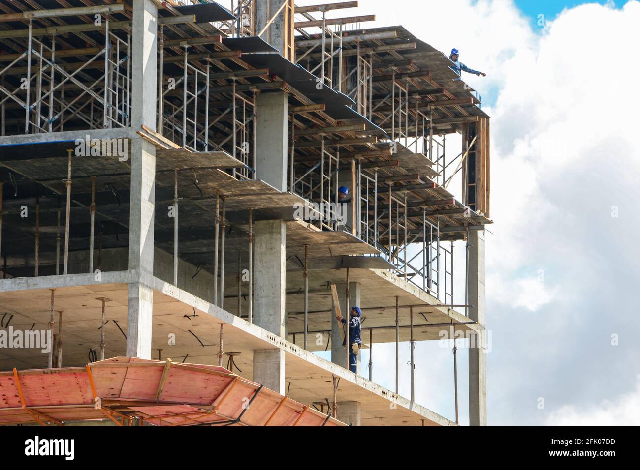 Civil construction of a building with part of the structure ready and ...