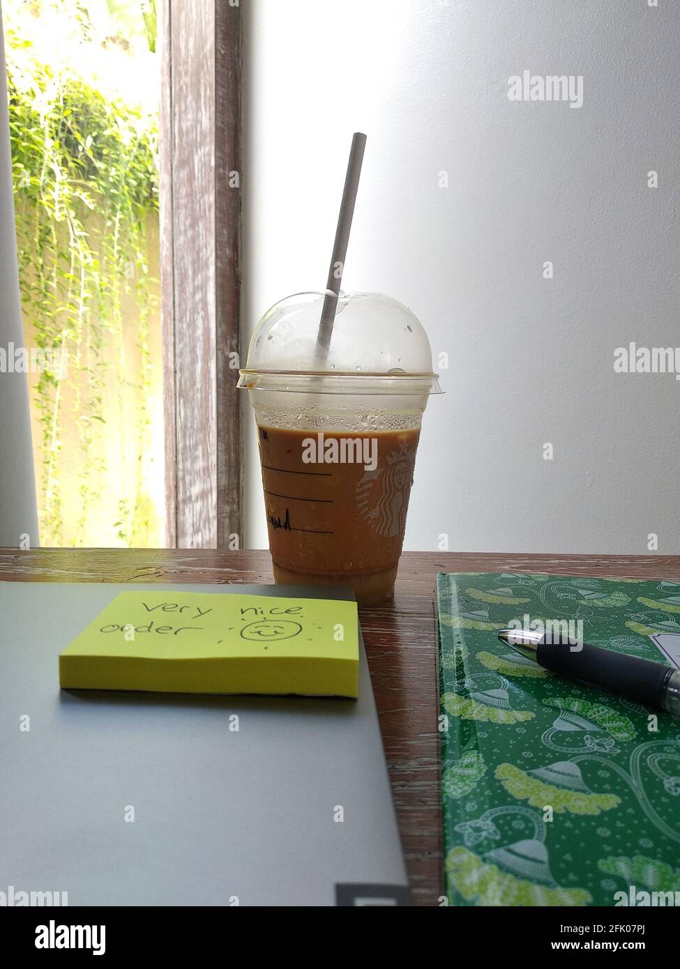 DENPASAR, INDONESIA - Jan 26, 2021: Starbucks coffee on the desk ...