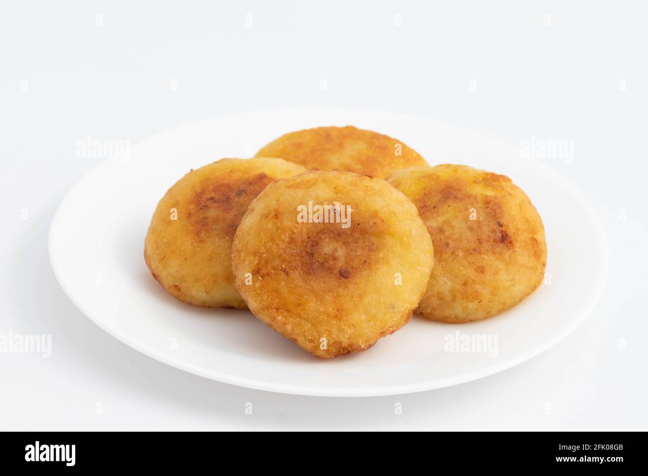 Aloo Tikki Also Known As Alu Ki Tikkia Is Seasoned Boiled Mashed Potato ...