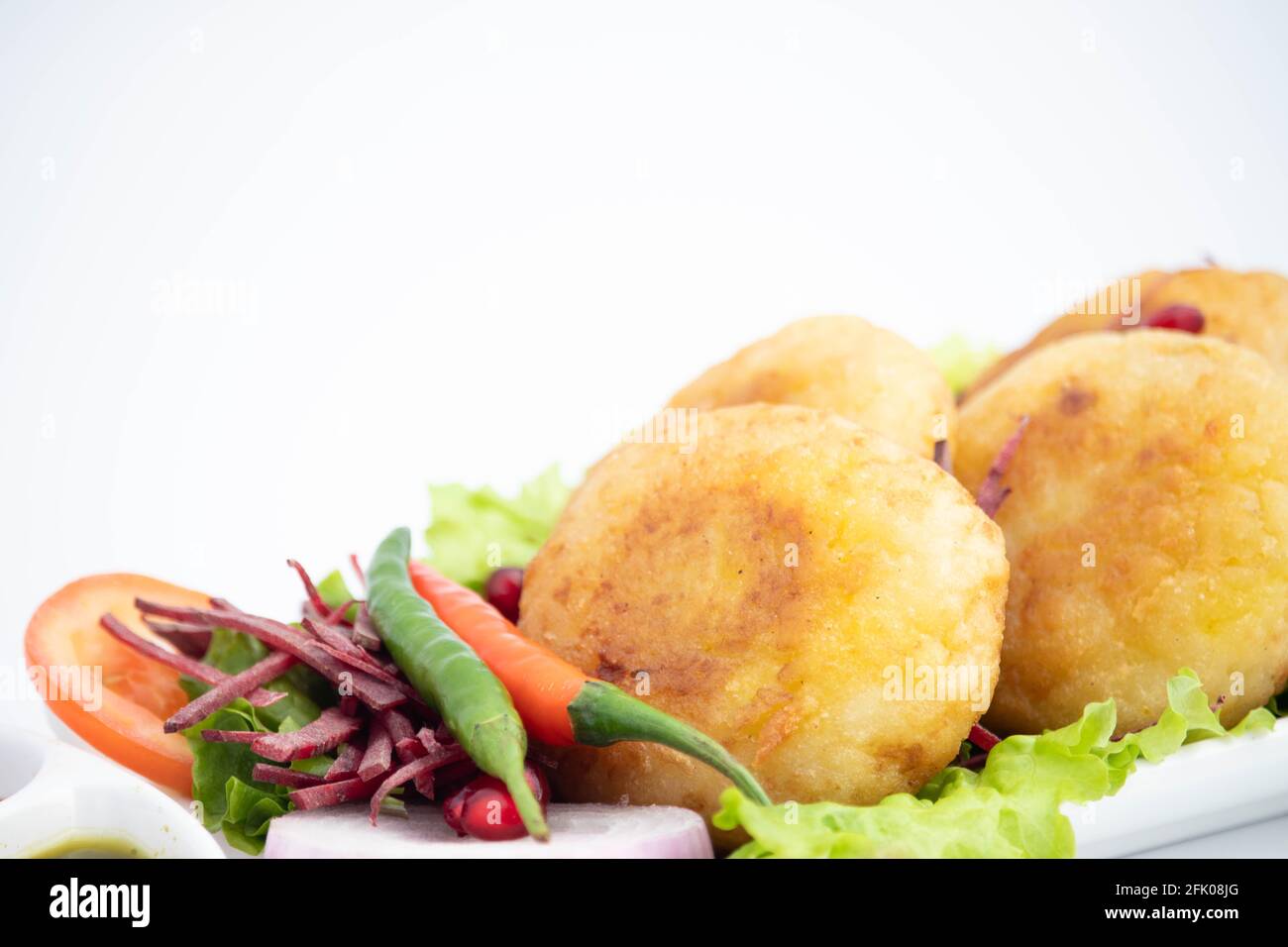 Aloo Tikki Also Known As Alu Ki Tikkia Is Seasoned Boiled Mashed Potato ...