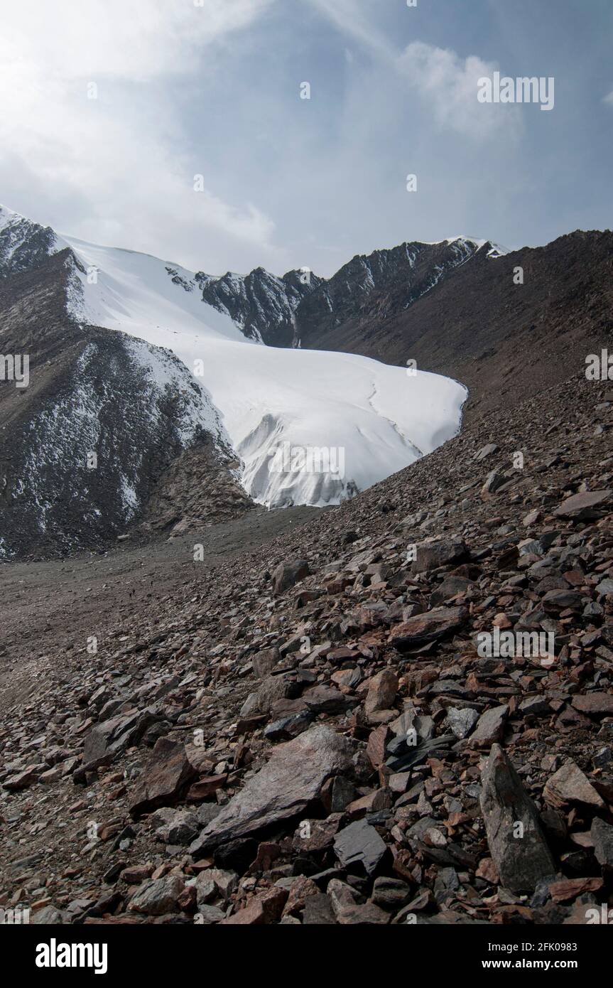 Fresh snow covers the top of the Xinjiang Tianshan No 1 Glacier, where ...