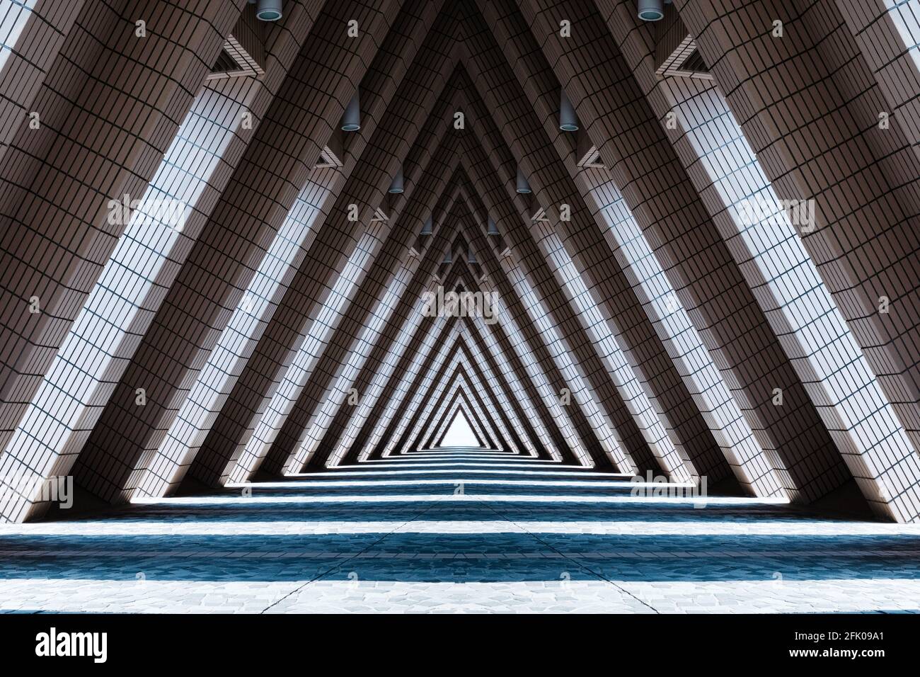 urban architecture tunnel , triangle shape corridor Stock Photo - Alamy
