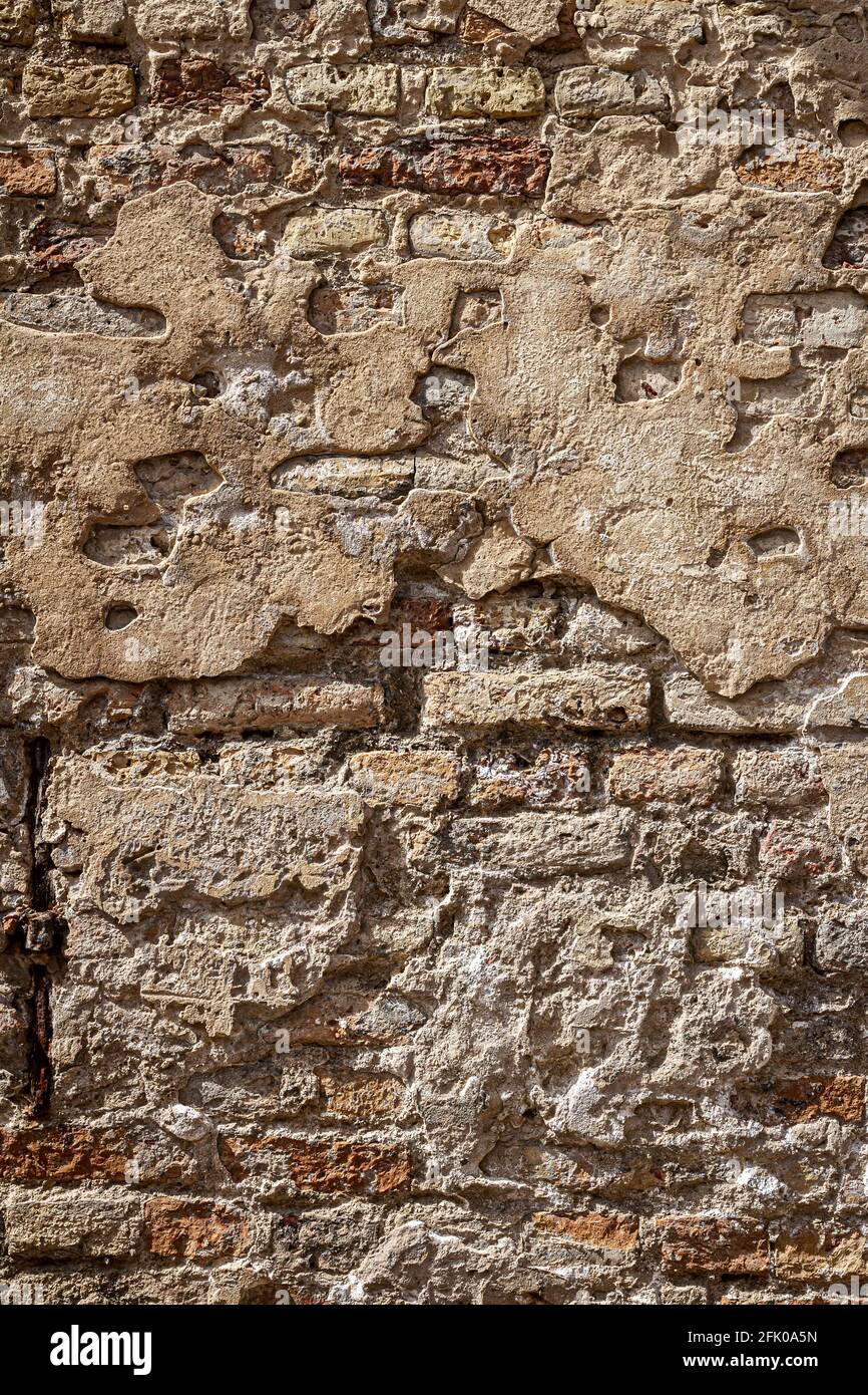 Old brick and plaster wall texture background. Painted distressed wall ...