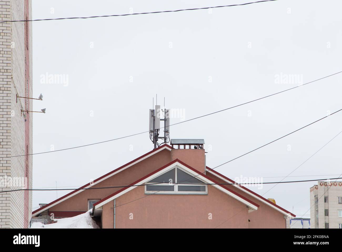 Telecommunication antenna next to a residential building. Cellular and ...