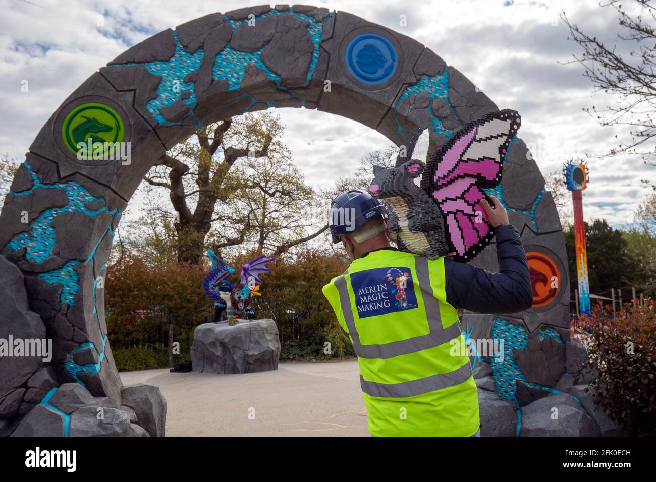 Matt Phillips carries one of the newly installed LEGO models in the new ...