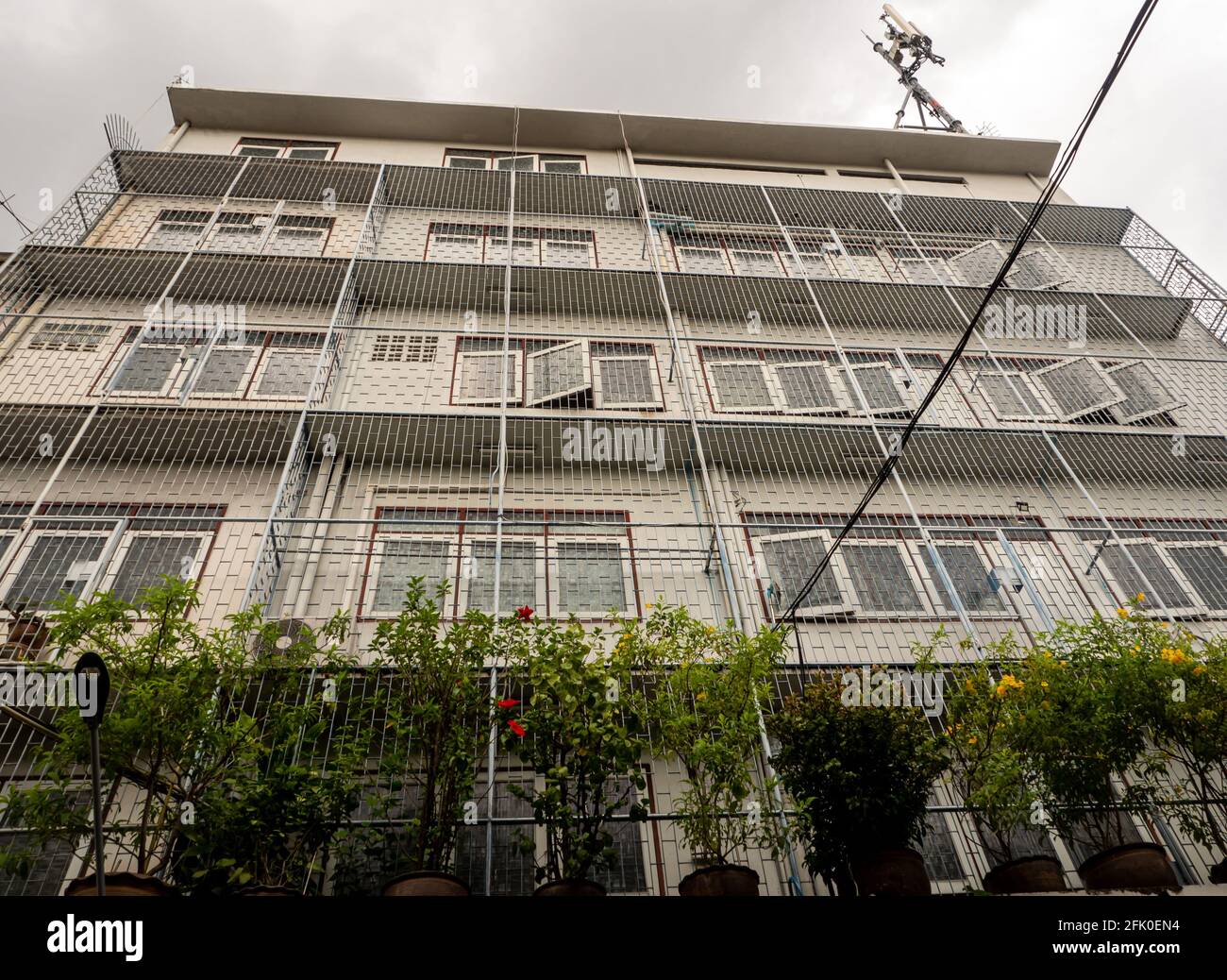 Old residential building Install a wrought-iron cage Stock Photo - Alamy