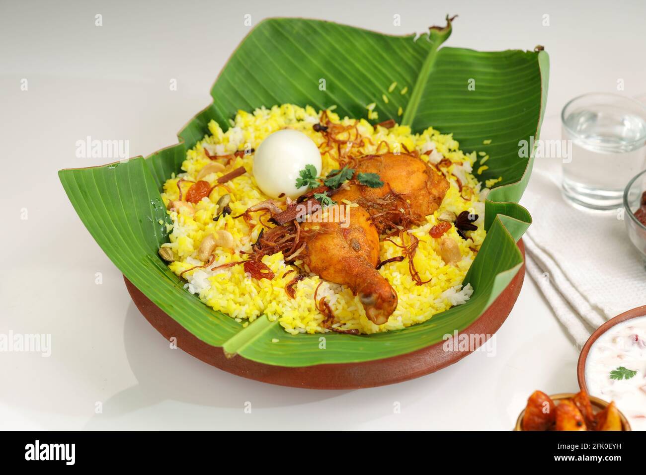 Chicken biryani , kerala style chicken dhum biriyani arranged ...