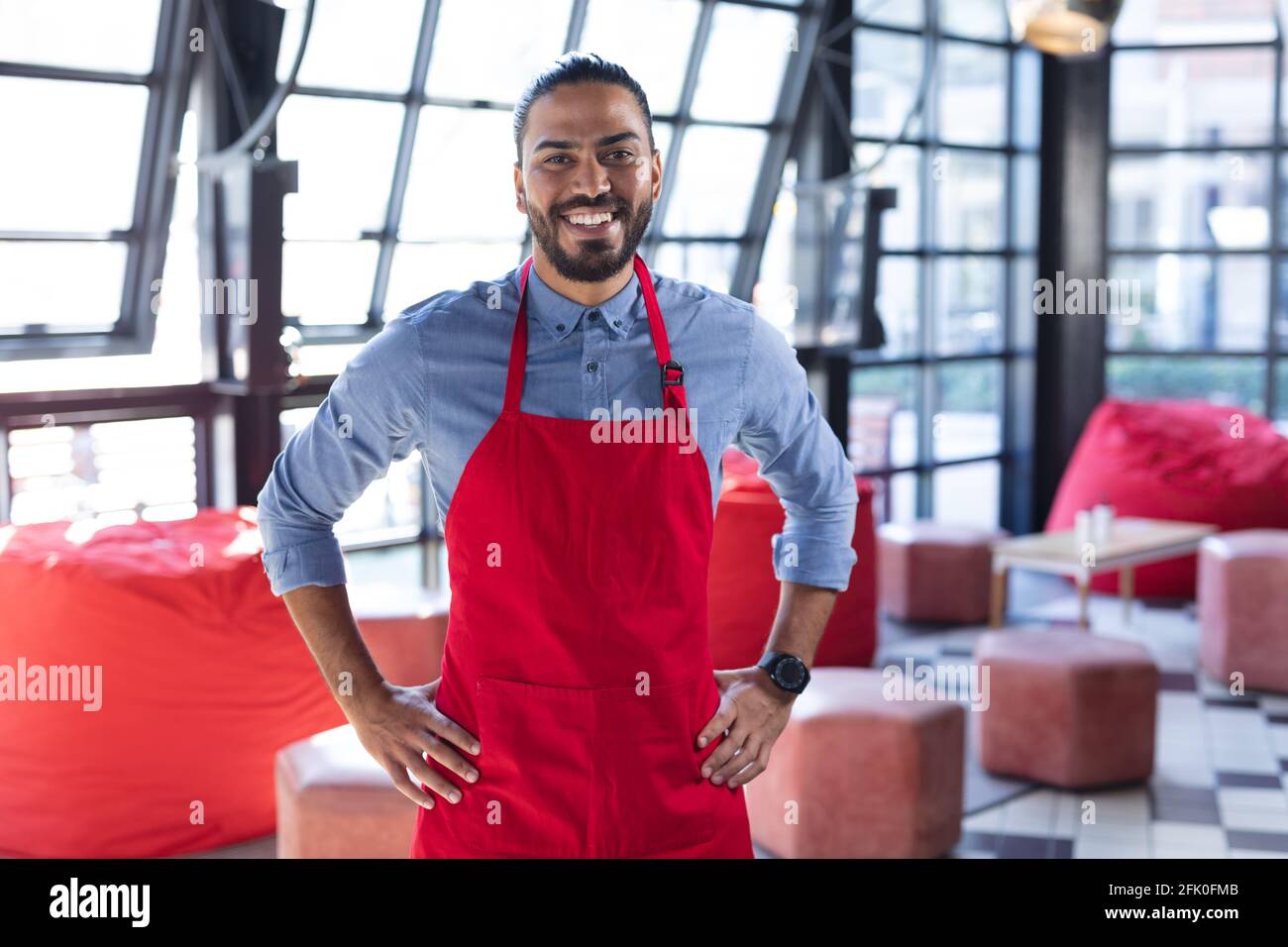 Smiling barista looking camera hi-res stock photography and images - Alamy