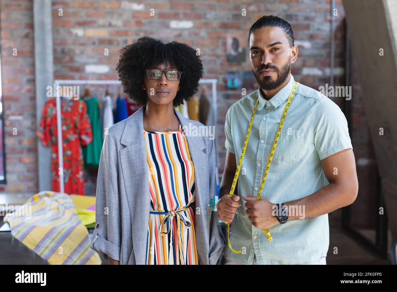 Portrait of diverse male and female designers looking at camera Stock ...