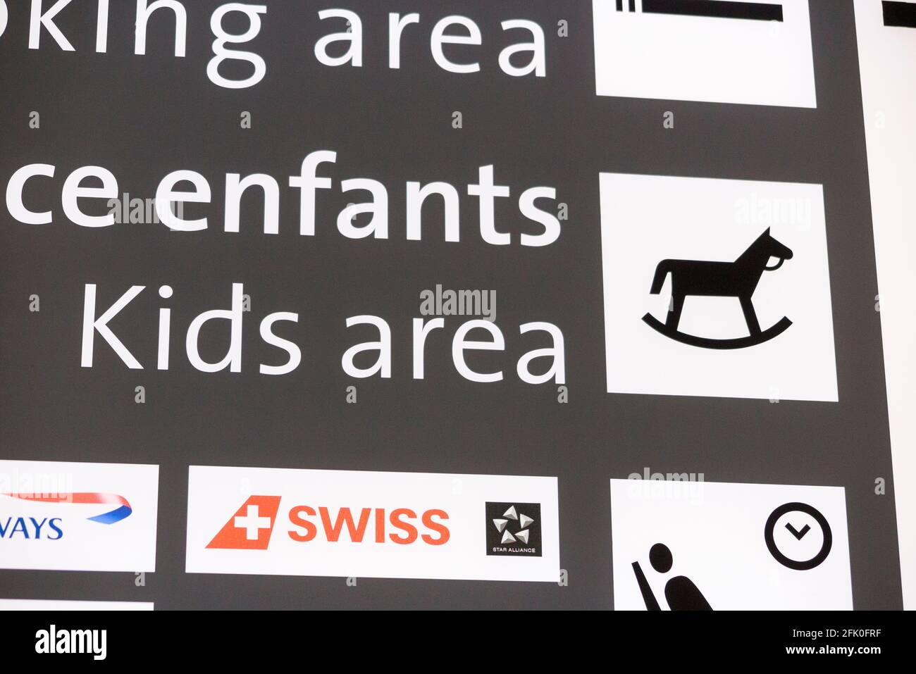 Sign board / screen indicating location of kids / children's play area ...