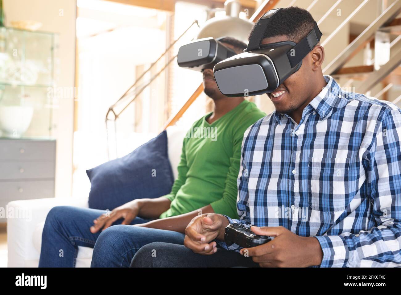 Brothers family sofa console hi-res stock photography and images - Alamy