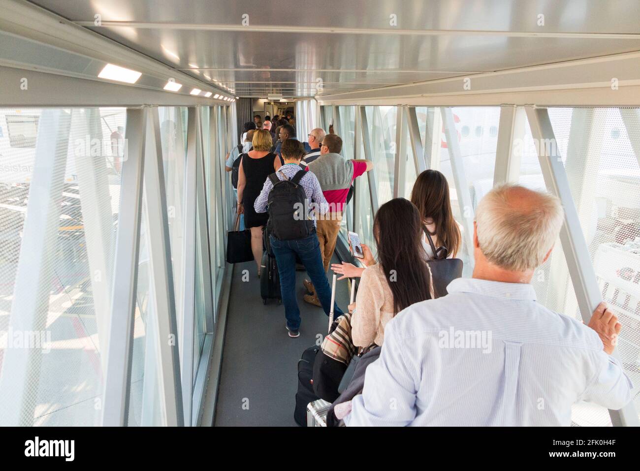 Passenger / passengers board / boarding plane / airplane / aeroplane ...