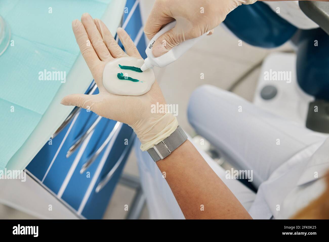 Orthodontist leaving two stripes of gel on dental cast putty Stock ...