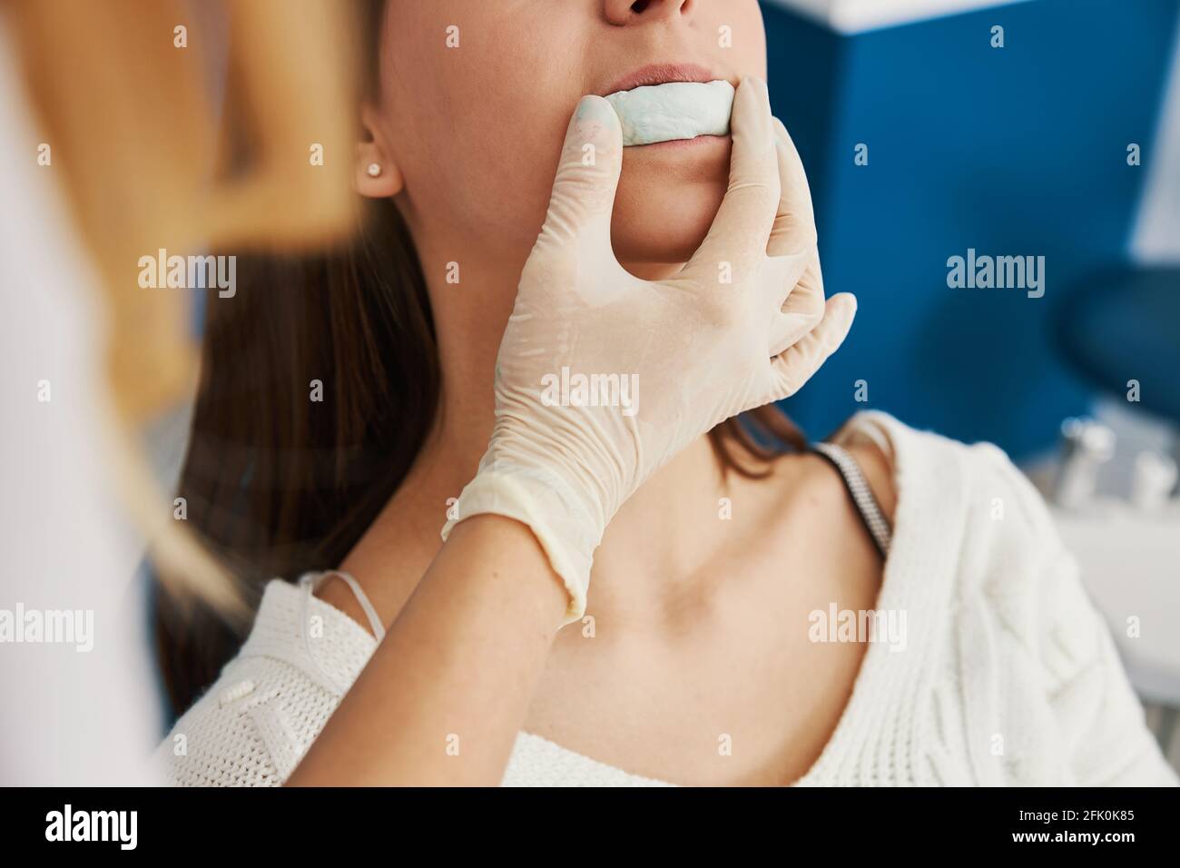 Dentist holding cast in hand hi-res stock photography and images - Alamy