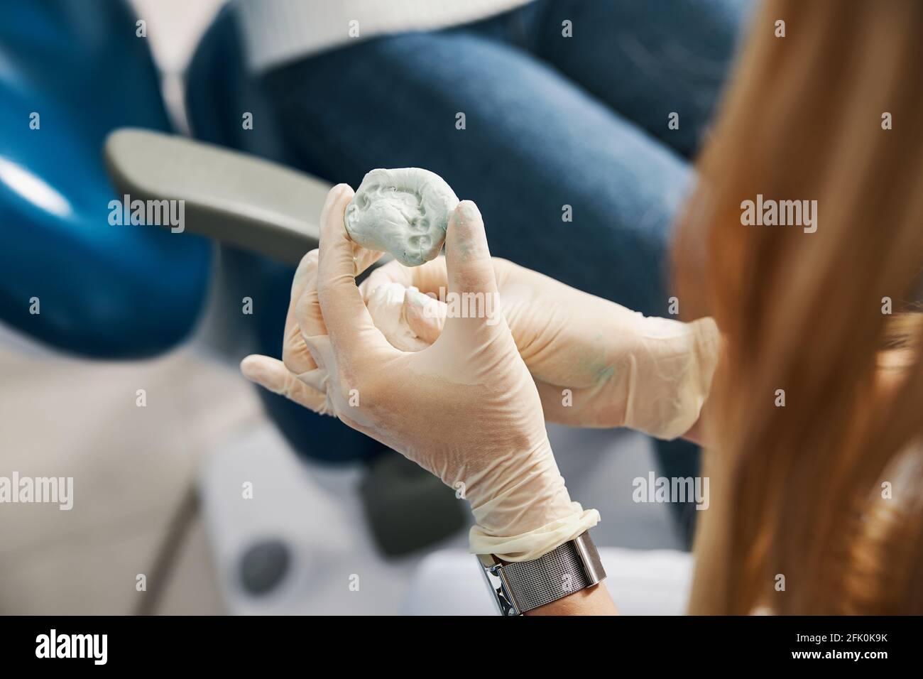 Dentist holding cast in hand hi-res stock photography and images - Alamy
