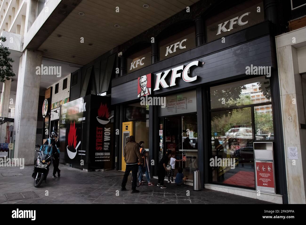 Athens, Greece. 27th Apr, 2021. People seen outside a KFC fast food ...