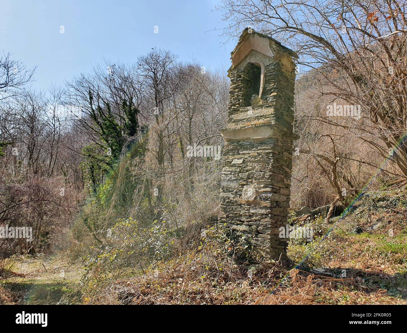 Old ruined monument-tower in Boschi di Alpicella, Parco del Monte ...