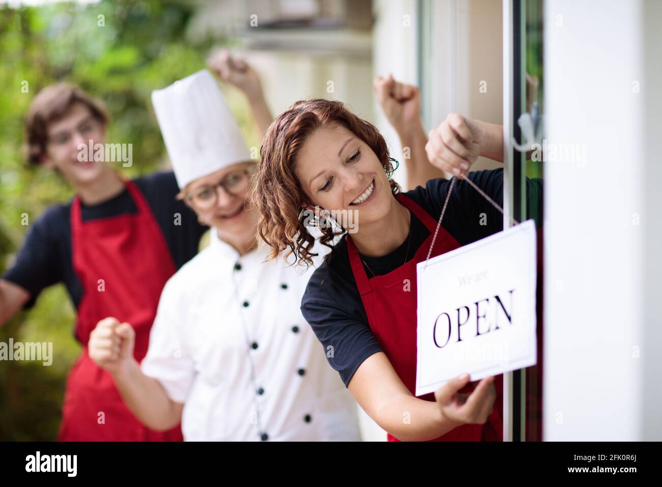Cafe opening after lockdown. Open sign on front door of restaurant or ...