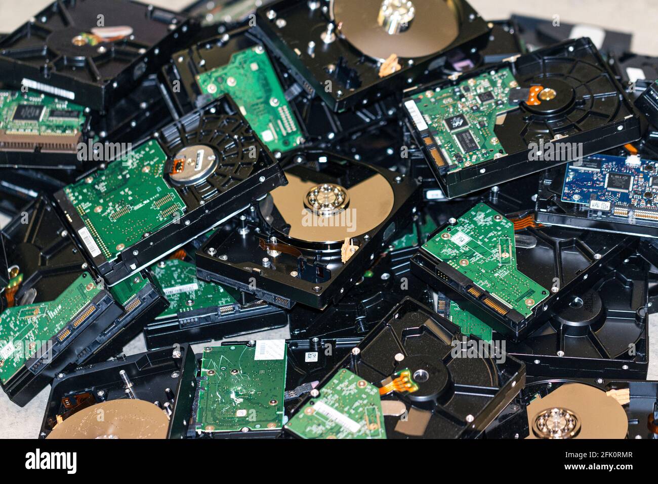 many computer hard drives lie on top of each other to destroy data ...