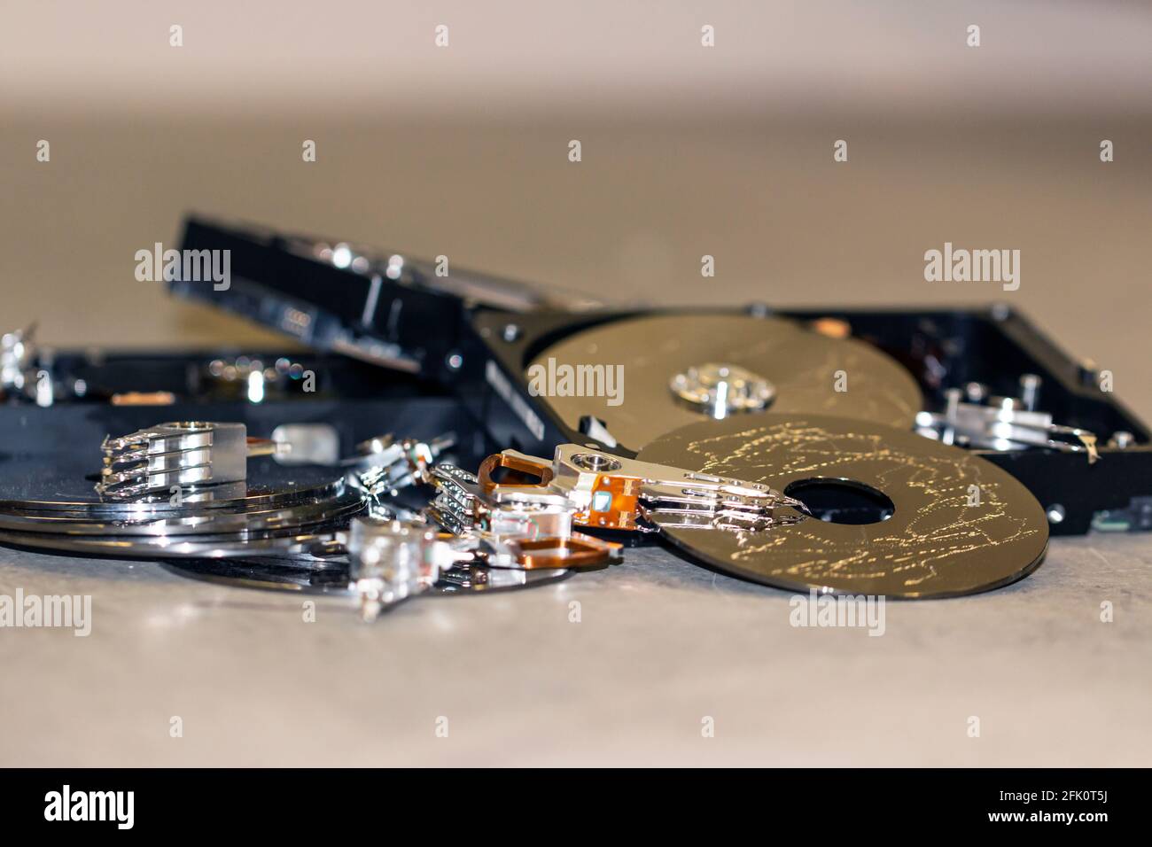 many computer hard drives lie on top of each other to destroy data ...