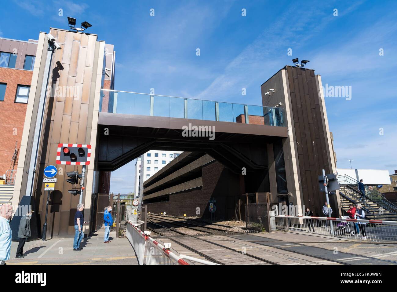 Modern Pedestrian footbridge with lifts over railway through Lincoln ...