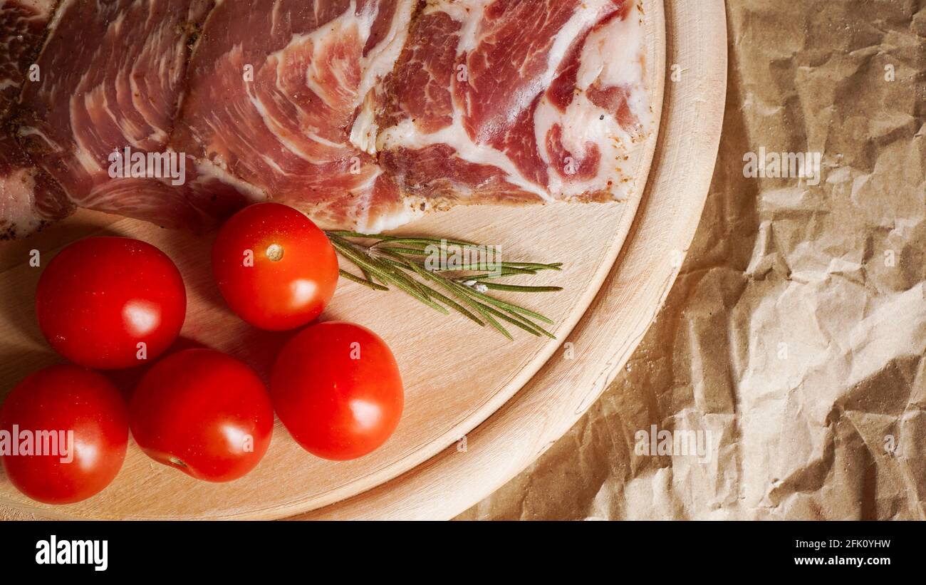 Meat slices and cherry tomatoes. Ingredients for sandwich and ...