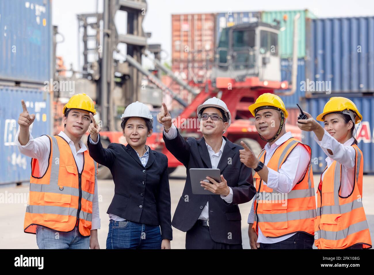 Architect of engineer and dock worker staff working checking at ...