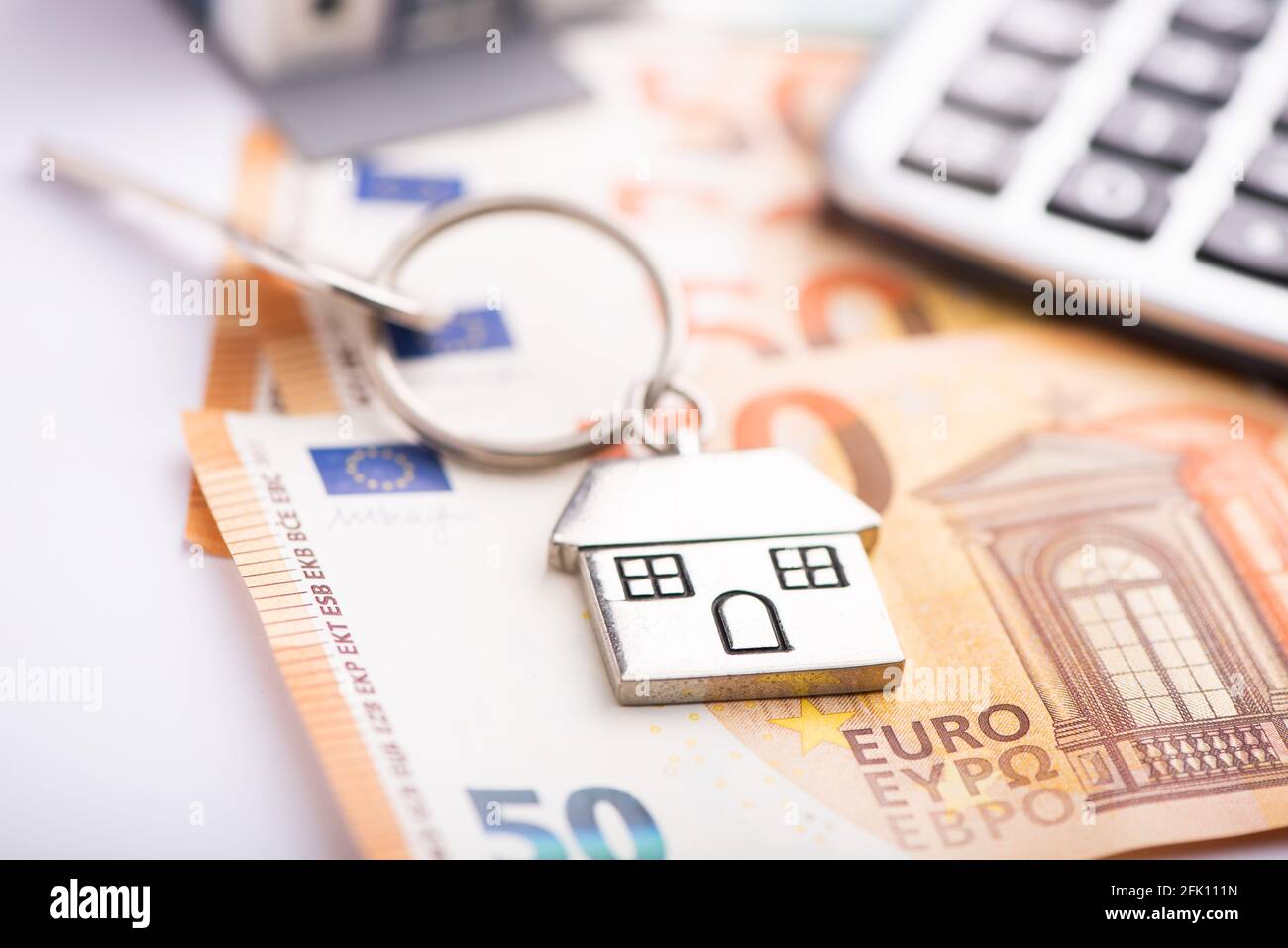 House key on Euro Banknotes. Close up Stock Photo - Alamy