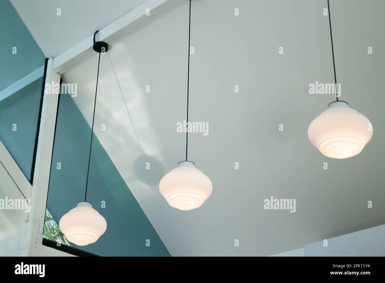 Light lamp hanging from the ceiling Stock Photo - Alamy