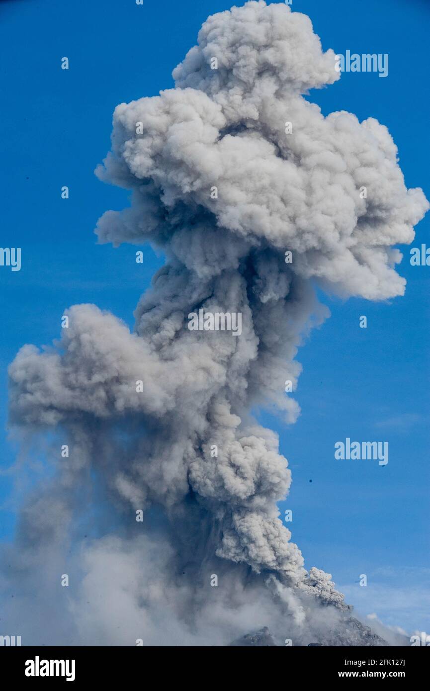 Sinabung volcano seen spews the volcanic ash to the air during eruption ...