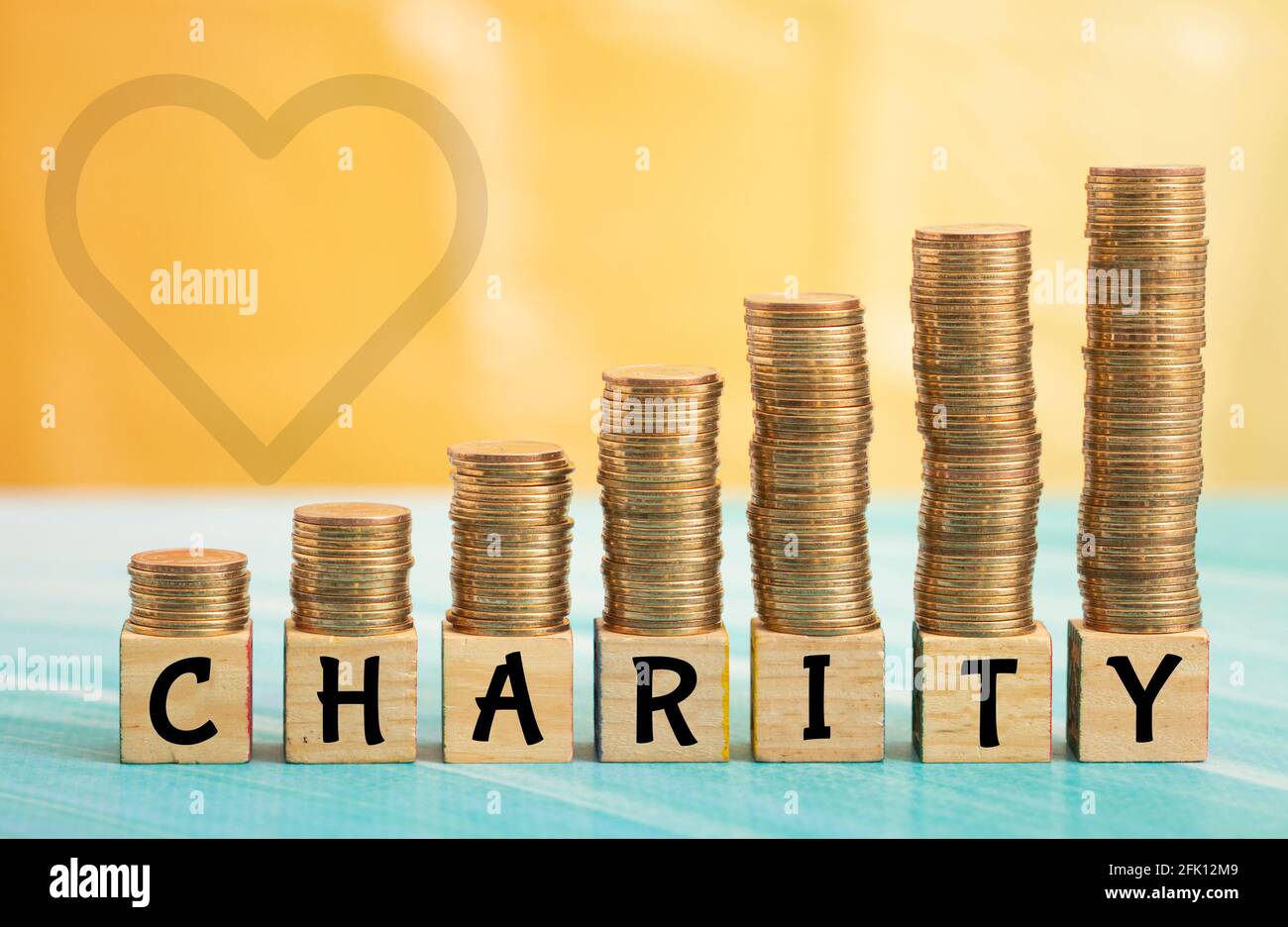 money coins for charity Stock Photo - Alamy