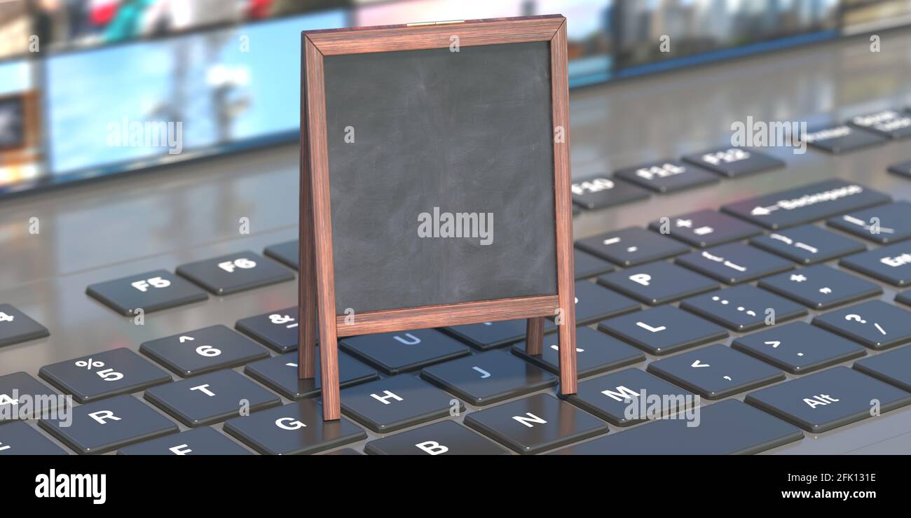 Menu board empty blank on laptop computer. Wooden frame chalkboard for ...
