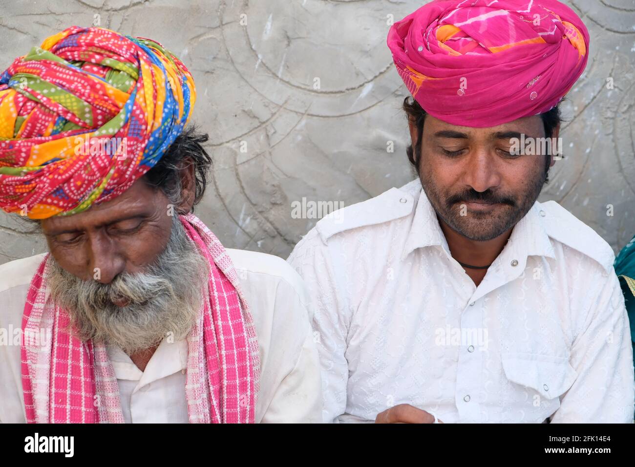 Indian males wearing traditional Indian clothes and a medical mask at a ...