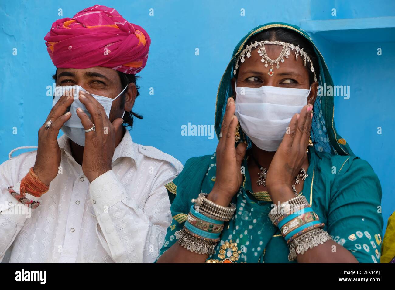Indian male and a female wearing traditional Indian clothes and a ...