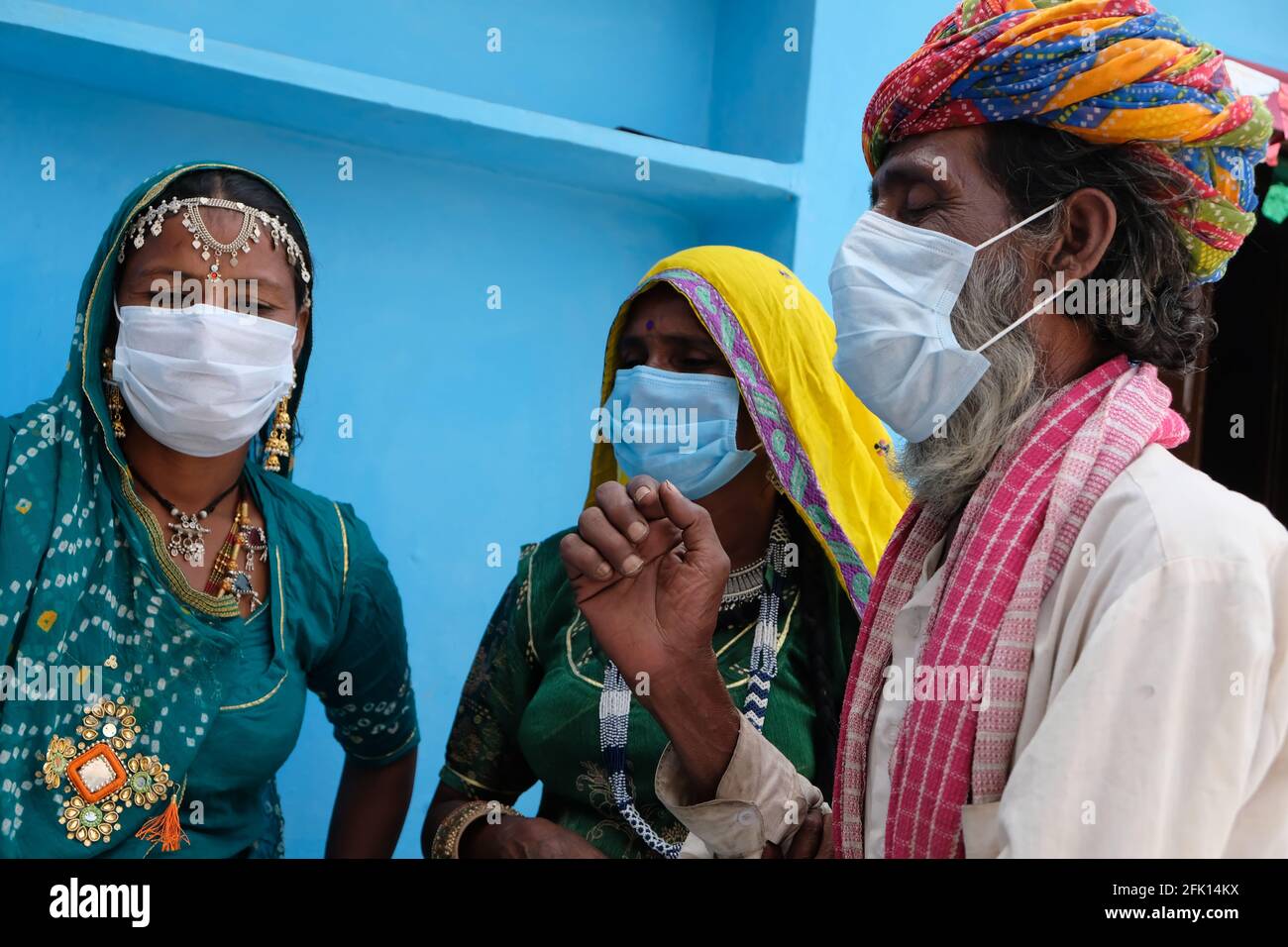 Group of Indian people wearing traditional Indian clothes and a medical ...