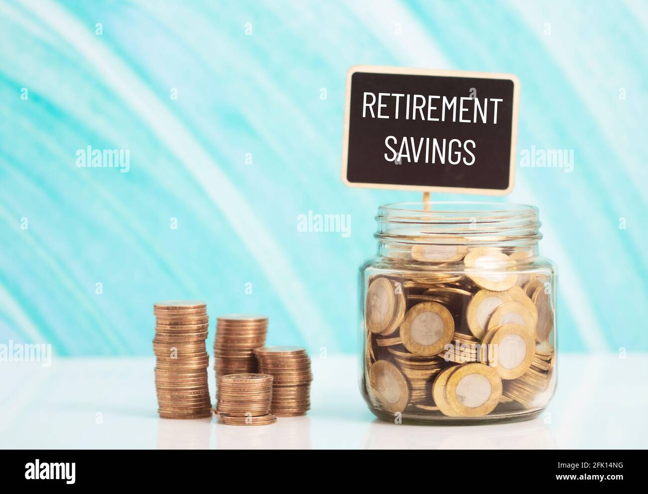 retirement savings in a bottle with coins Stock Photo - Alamy