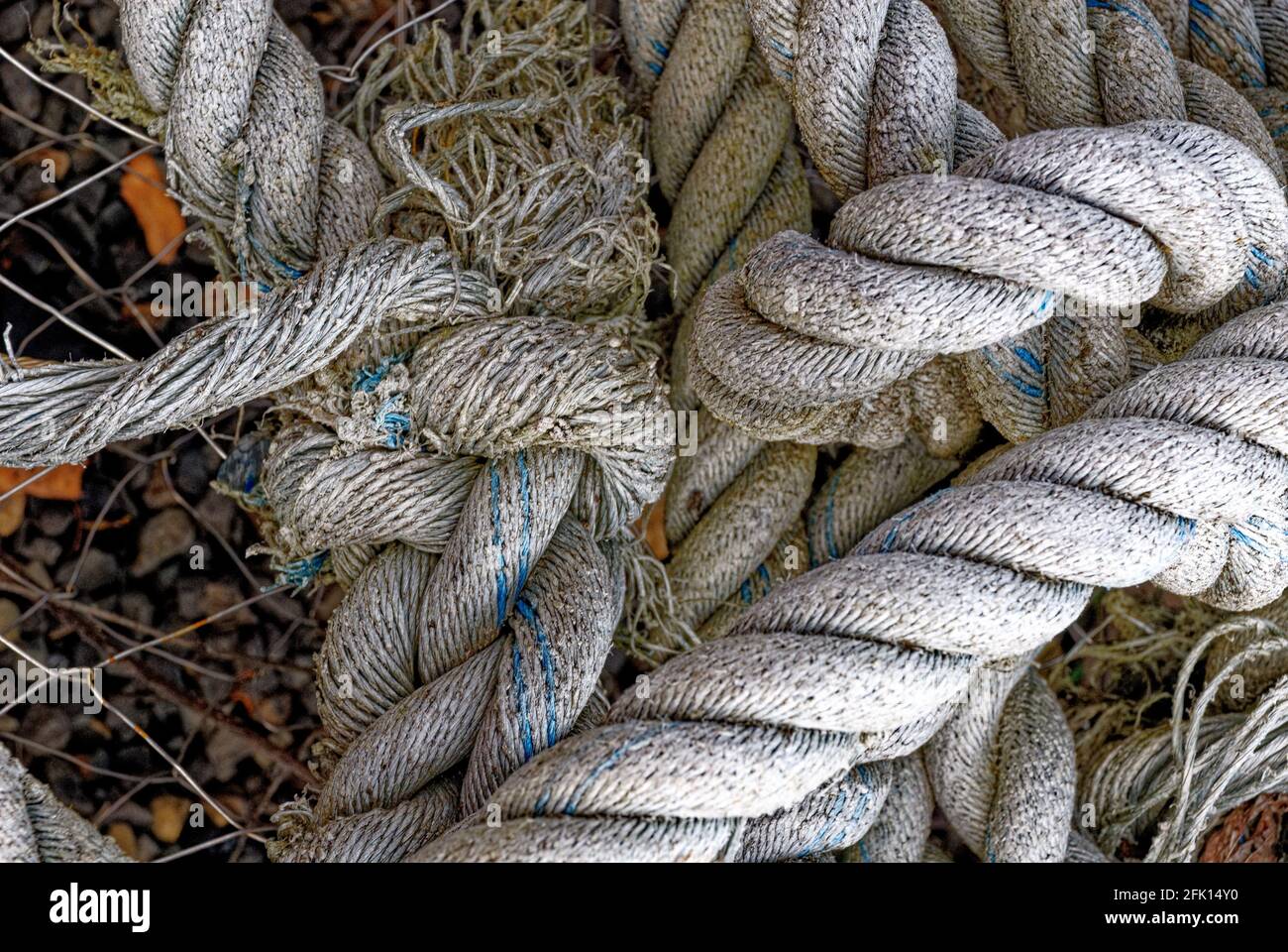 Fishing ropes piled up in a stack - Detail of messy fishing ropes Stock ...