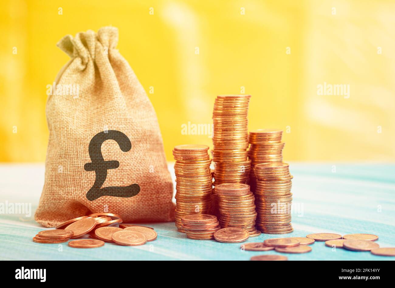 ponds in a money bag Stock Photo - Alamy