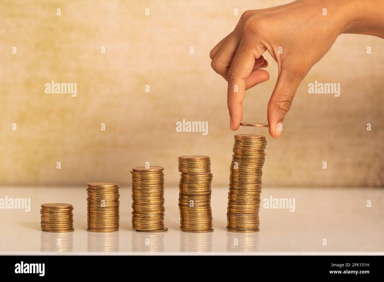saving money of women hand Stock Photo - Alamy