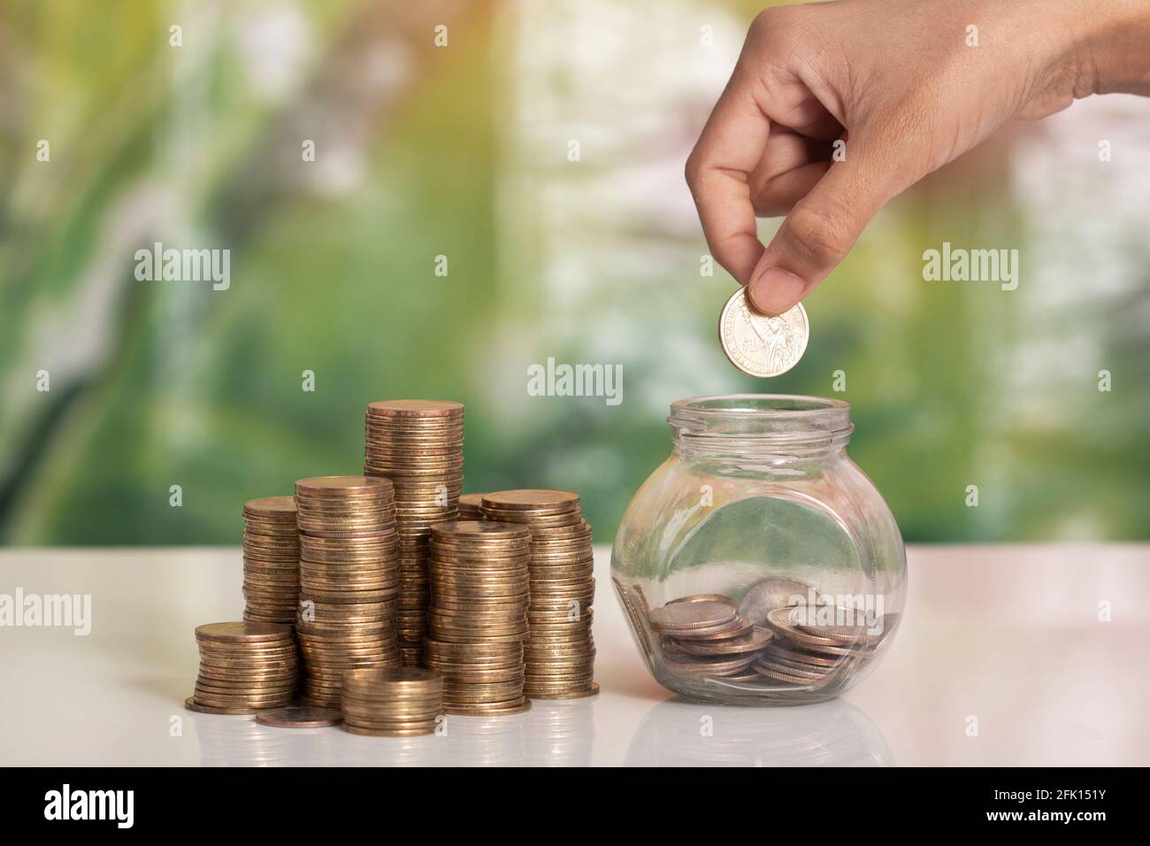 Bottle of coins hi-res stock photography and images - Alamy